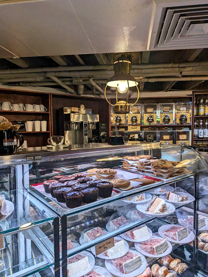 Where pastry dreams come true behind glass. Each slice patiently waiting for its moment of glory on your plate.