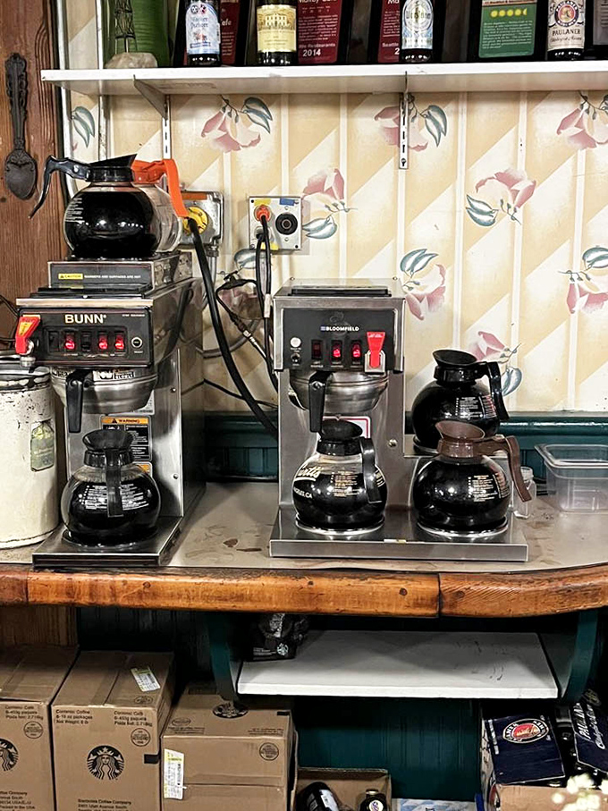 Multiple coffee pots lined up like soldiers ready for battle&mdash;because great breakfast starts with serious caffeine reinforcements, no exceptions here.