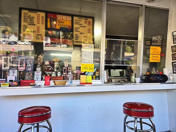 Red bar stools and a counter filled with memorabilia&mdash;each trinket tells a story, each menu item promises satisfaction.