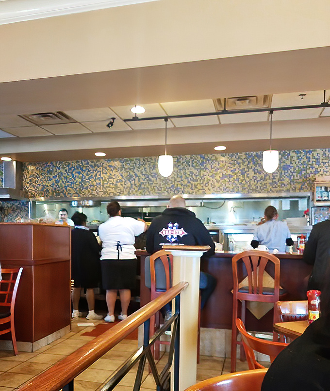 Where breakfast dreams become reality &ndash; the open kitchen design lets you witness the pancake magic as it happens.