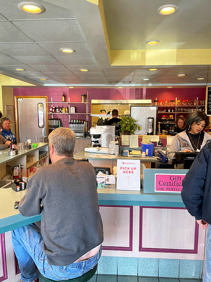 The counter&mdash;that magical divide where coffee appears, orders materialize, and friendly banter flows as freely as the maple syrup.