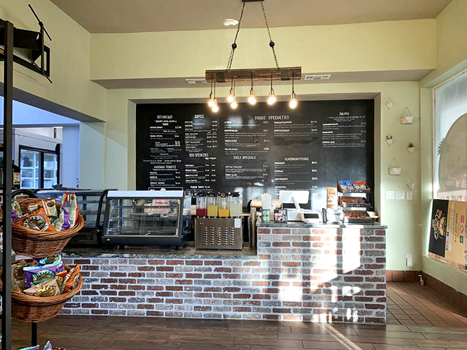 The command center of sandwich creation &ndash; brick counter, chalkboard menu, and pendant lighting that says "we take bread seriously here."