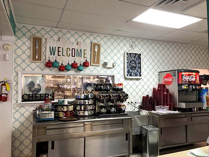 Coffee station ready for action with mugs standing at attention. The "Welcome" sign isn't just decoration – it's a promise.