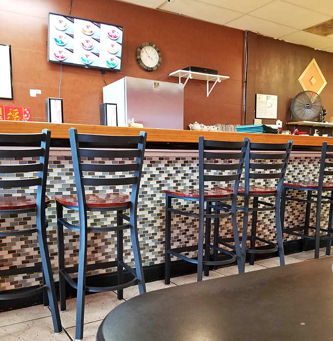The counter's mosaic tile front adds a touch of style to this utilitarian space. It's where the magic happens&mdash;orders in, deliciousness out.