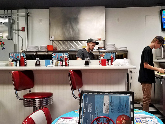 The counter seats offer front-row tickets to the greatest show in town: breakfast professionals turning simple ingredients into morning magic.