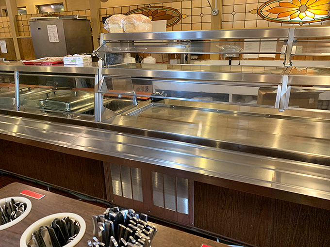 Stainless steel counters gleaming like a promise that everything here is made fresh, made right, made with care.