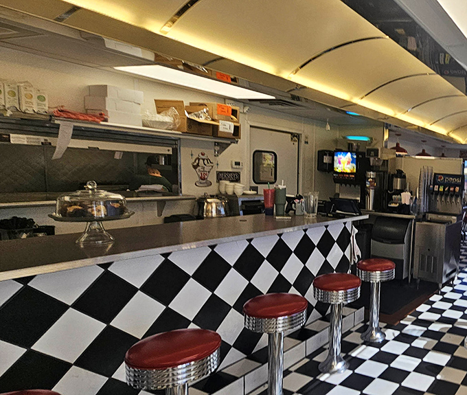 The counter where magic happens &ndash; those red-topped stools have witnessed countless first dates, family outings, and travelers finding their bearings.