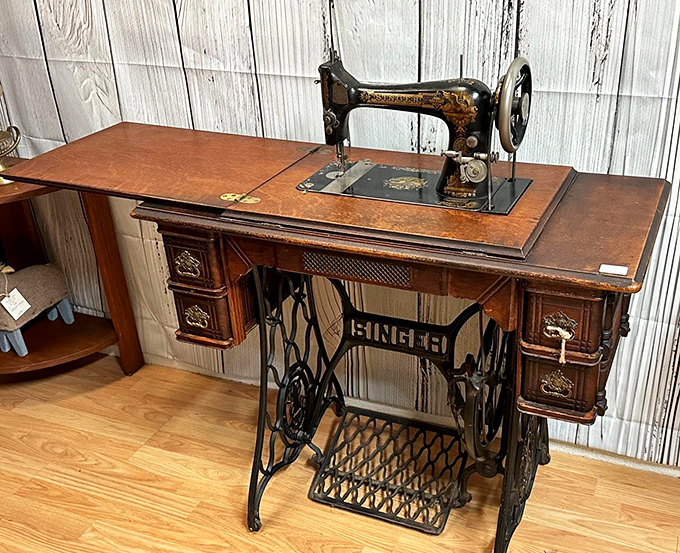 A Singer sewing machine that's outlived countless fashion trends. That cast iron base has supported more creative dreams than most art schools.