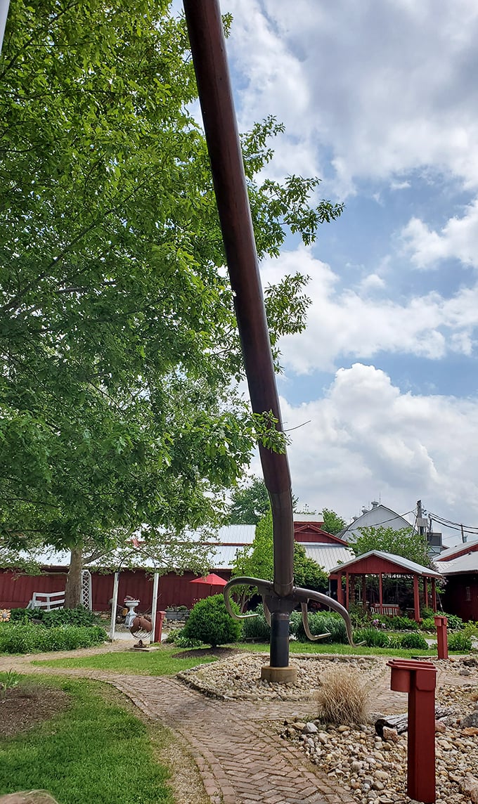 Looking up from below, the handle stretches toward the clouds like Jack's beanstalk, making even adults feel child-sized again.