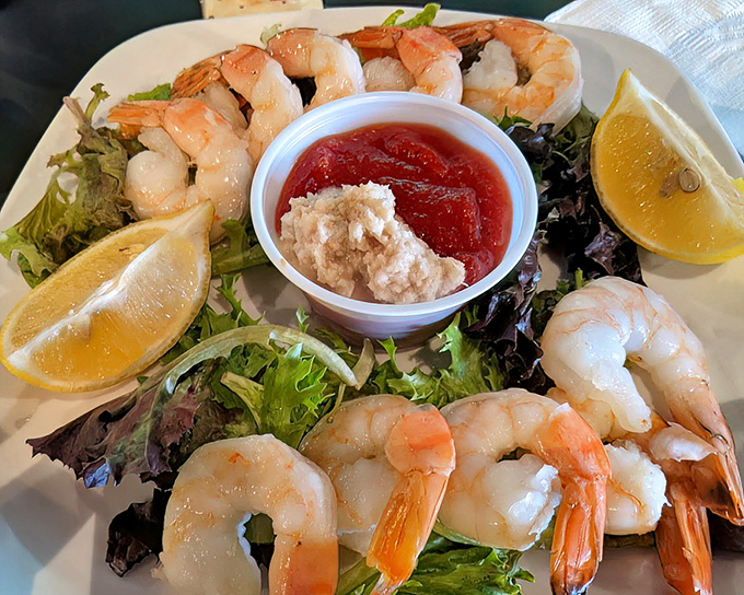 These shrimp, arranged like synchronized swimmers around their dipping sauces, are the opening act that threatens to upstage the headliner.