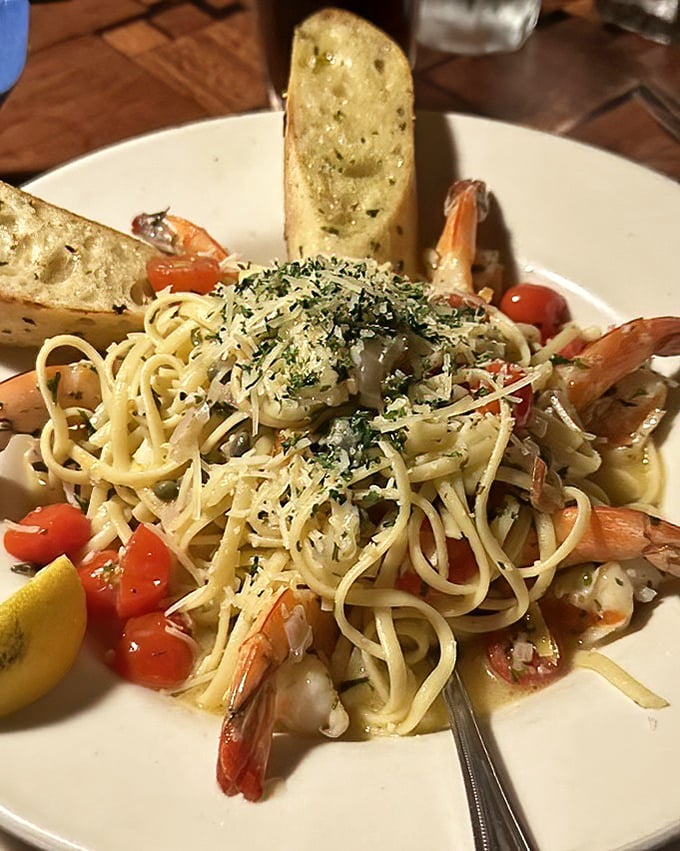 This shrimp scampi pasta isn't just a dish—it's a Mediterranean vacation twirled around your fork, with each bite offering frequent flyer miles.