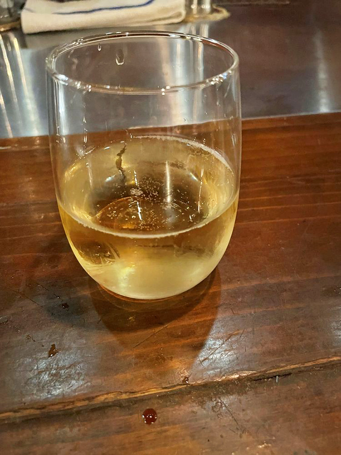 A glass of something sparkling and crisp, because barbecue this good deserves a proper toast.