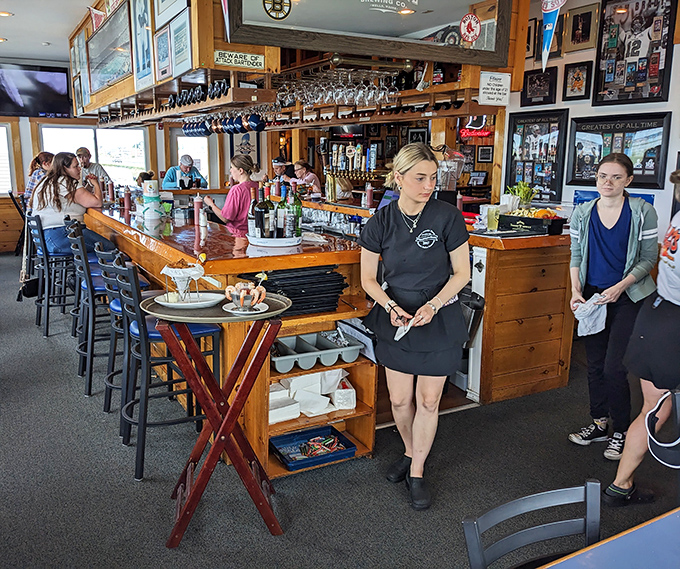 The bar area doubles as a community gathering spot. Those patrons aren't just customers &ndash; they're unofficial restaurant ambassadors.
