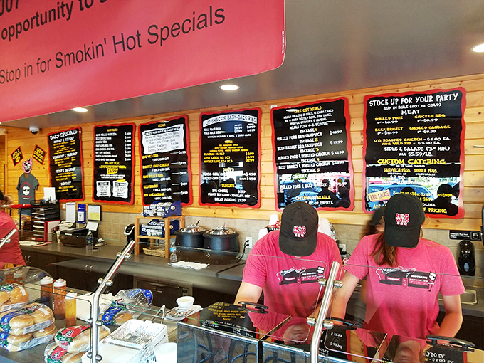 The pink-shirted team behind the counter holds the keys to your happiness. They've seen the look in your eyes before—barbecue desire is universal.
