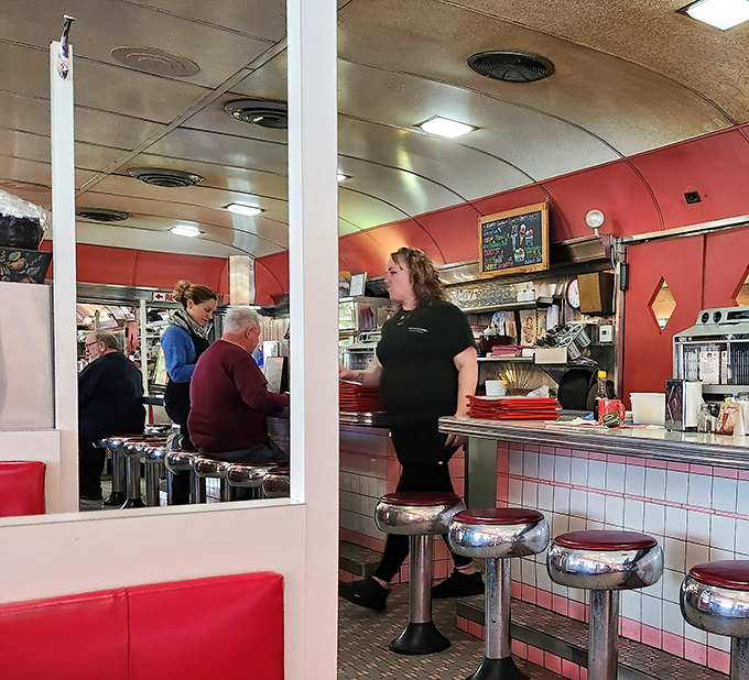 Where diner magic happens&mdash;staff navigating the narrow galley with the practiced choreography that comes from years of serving hungry patrons.