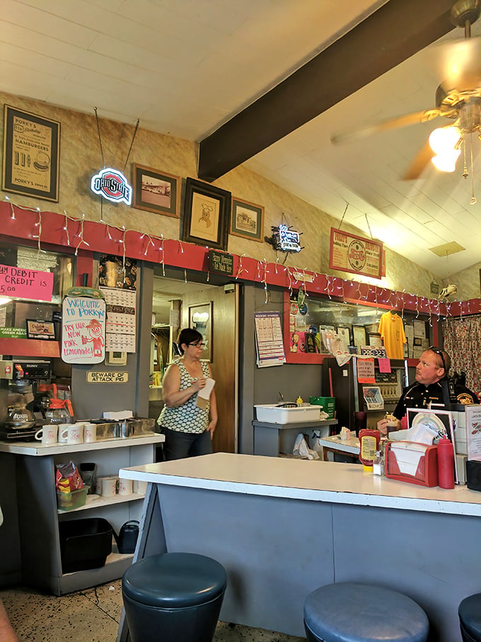 The heart of any great diner beats behind the counter, where orders become edible memories.
