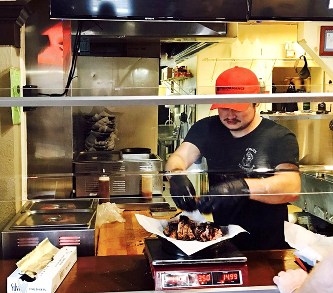 Behind every great barbecue is someone wielding tongs with the precision of a surgeon and the soul of an artist.