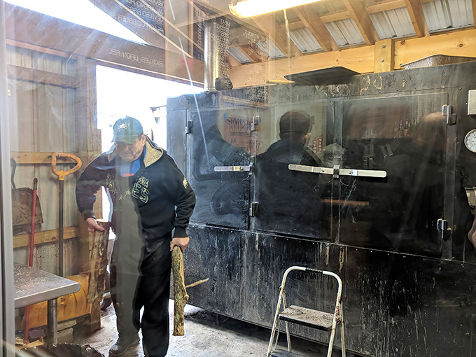 Behind every great barbecue is a dedicated pitmaster. The smokehouse's back area reveals where the real magic happens, far from customer view.