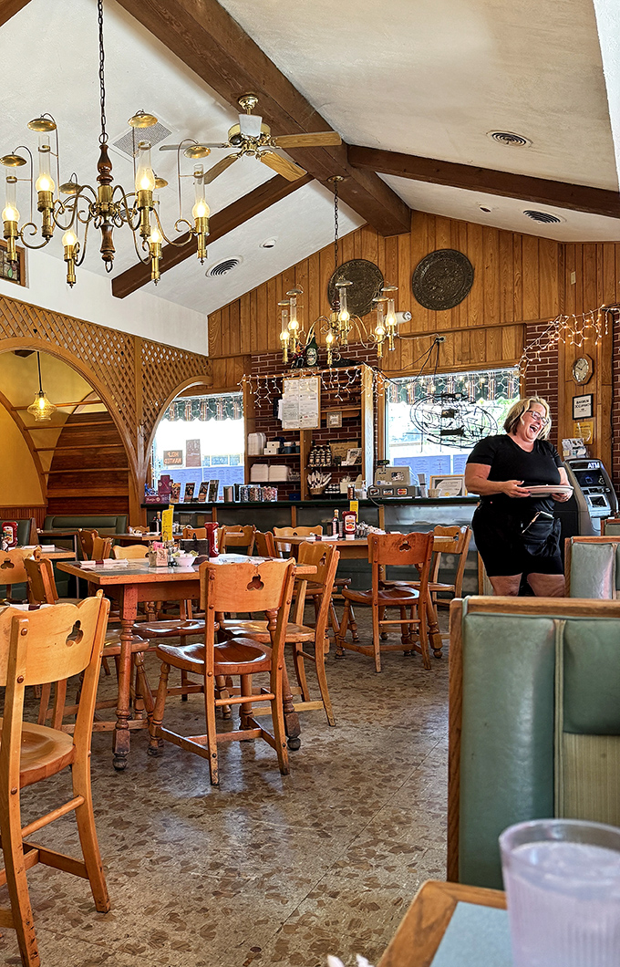 Where the magic happens &ndash; Lake Aire's dining room combines wood paneling, exposed brick, and the promise of plates arriving soon.