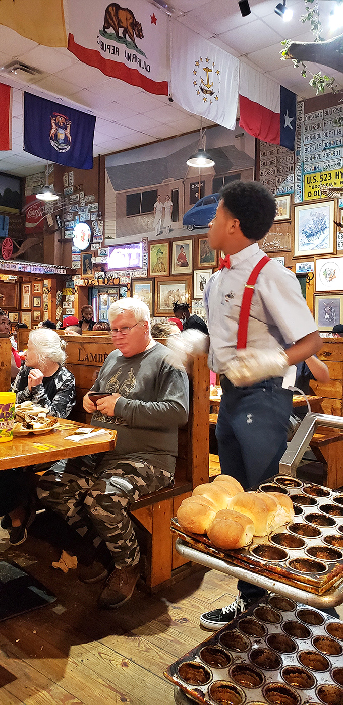 The servers at Lambert's don't just deliver food&mdash;they're bread-tossing athletes in suspenders, carrying on a tradition that defies modern restaurant norms.