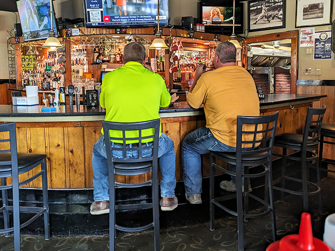 The bar at Frankie's isn't just where drinks are served – it's where neighborhood stories are exchanged and local legends are born.