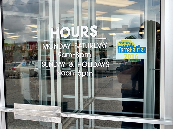 The hours of opportunity clearly displayed. Monday through Saturday, 9am-8pm, with Sundays noon-6pm—plan your treasure hunting accordingly.