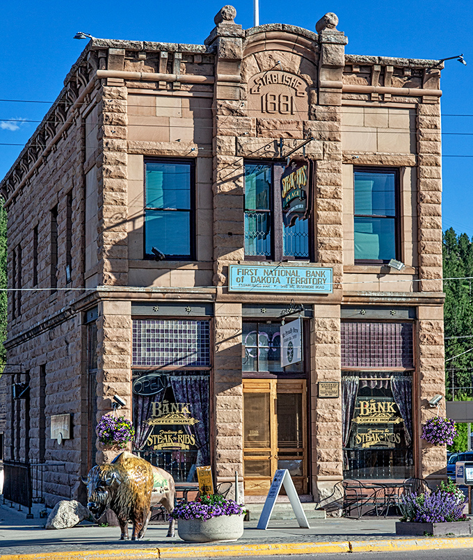 Banking on good taste! This historic financial institution now serves up lattes instead of loans, with a buffalo guardian keeping watch outside.