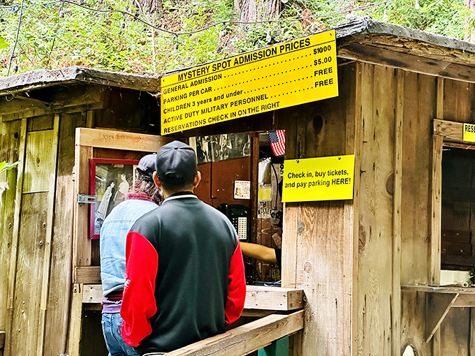 Visitors check in at the rustic ticket booth, where the adventure officially begins. The modest prices haven't changed much since your parents visited.