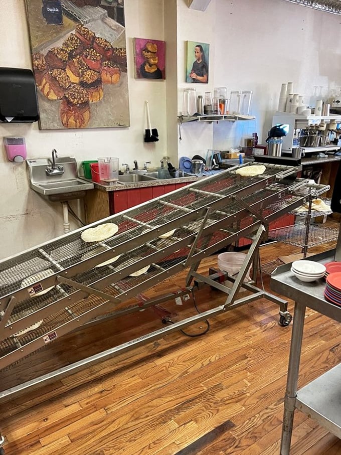 That tortilla machine cranks out fresh rounds all day, turning flour into the edible foundation of happiness.