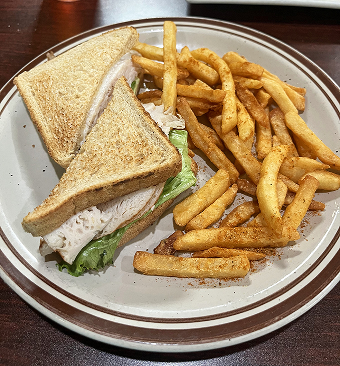 A classic turkey sandwich with crispy fries&mdash;sometimes the simplest pleasures are the most satisfying, especially on diner-quality bread.
