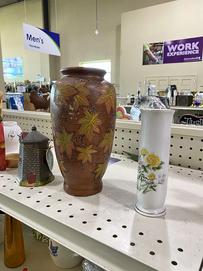 Vases with personality stand ready for their next floral arrangement. That autumn-leaf pottery piece would make even grocery store flowers look museum-worthy.