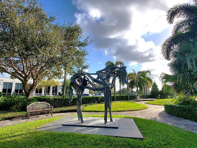 Veterans Memorial Island Sanctuary's striking sculpture honors sacrifice while pelicans soar overhead &ndash; a poignant Florida tribute.