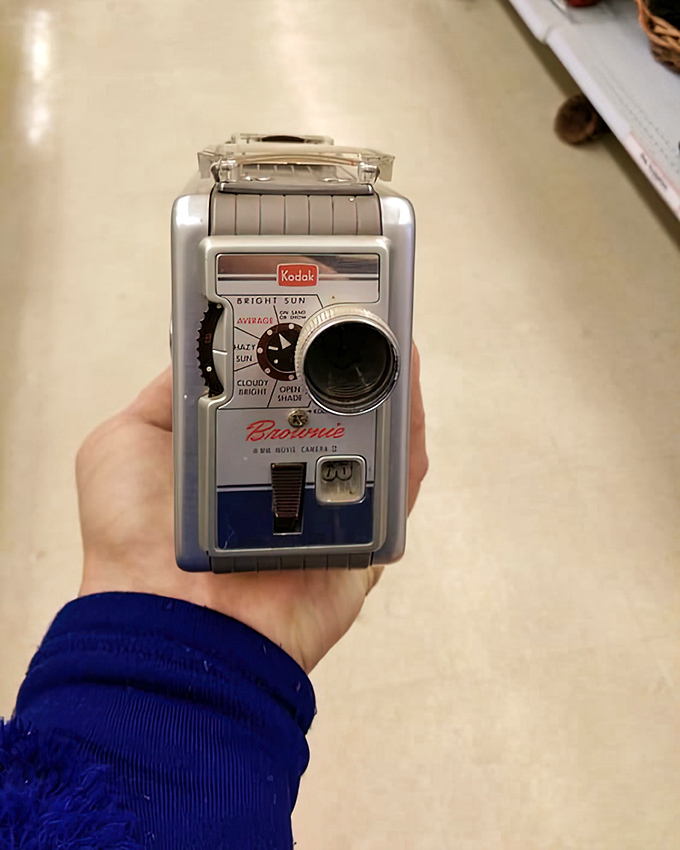 This vintage Kodak Brownie camera once captured someone's precious memories, now waiting to become your retro shelf decoration or conversation piece.