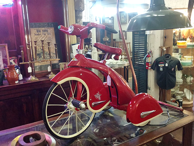 A tricycle so gloriously red it makes modern toys look like they're trying too hard. Childhood nostalgia on three perfect wheels.