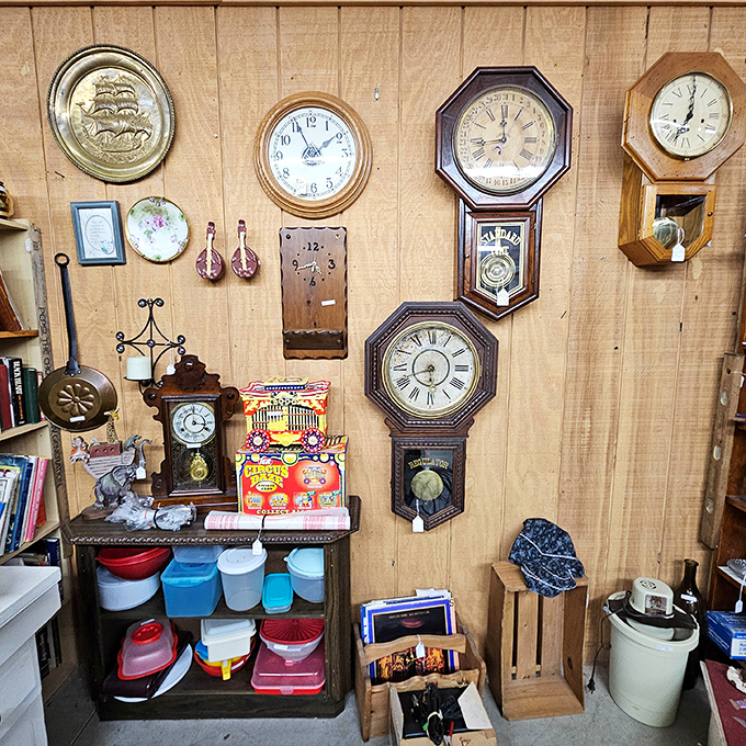 A wall where time literally stands still &ndash; vintage clocks frozen at different moments, waiting for someone to wind them back to life.