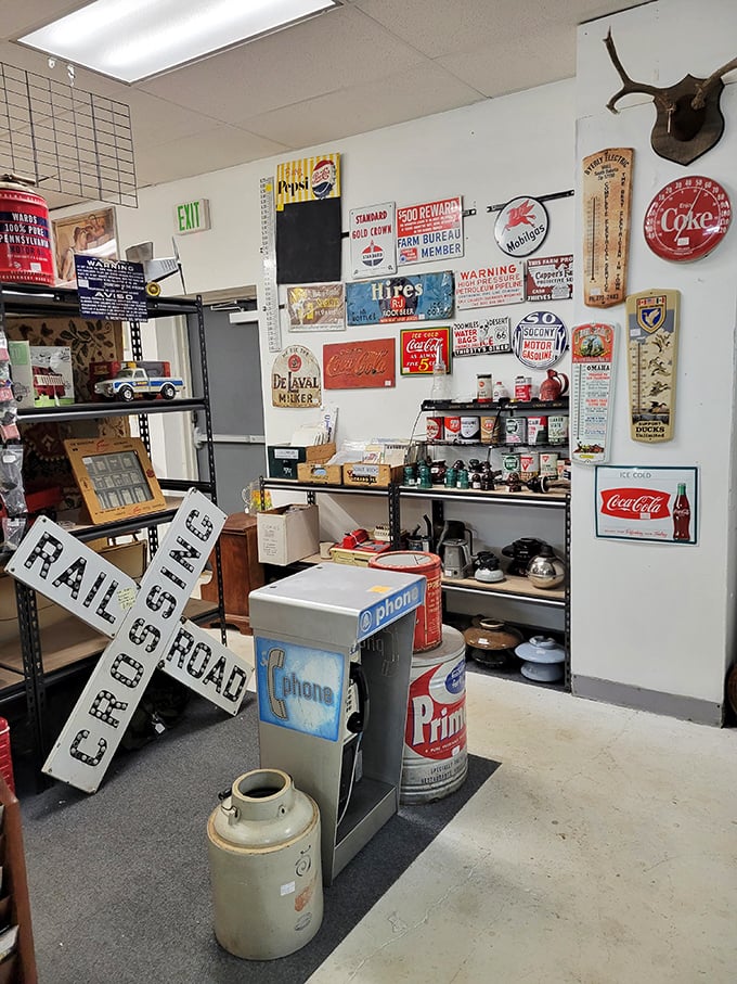 Before neon and digital billboards, these vintage advertising signs were America's Instagram. Coca-Cola hasn't changed much, but that phone booth definitely has!
