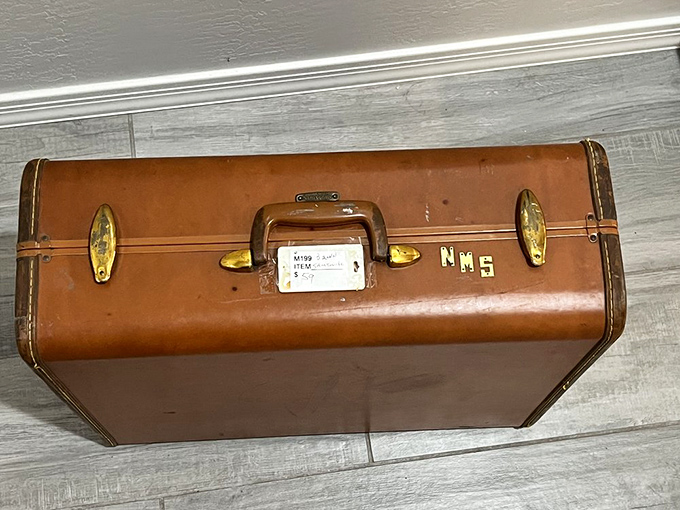 A well-traveled vintage suitcase with stories to tell&mdash;if only its leather sides could speak of the journeys it's witnessed.