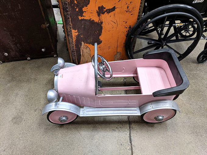 This vintage pink pedal car isn't just transportation for tiny humans—it's childhood nostalgia on wheels at a fraction of collector prices.