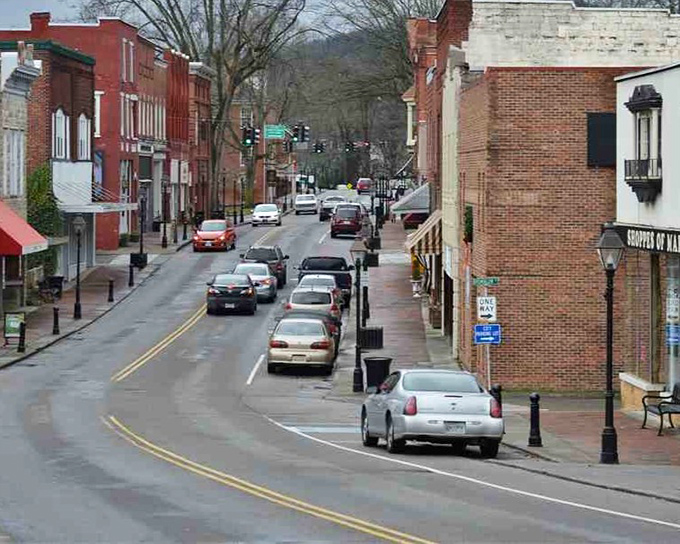 Even on rainy days, Rogersville maintains its charm, with historic lampposts casting gentle light on wet brick sidewalks.