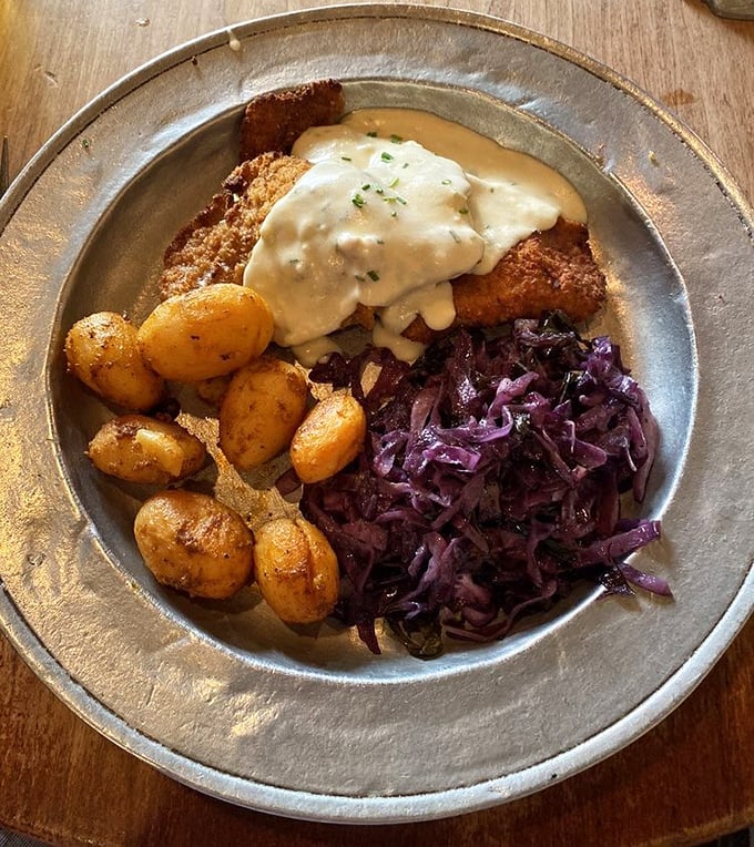 Weinerschnitzel dressed to impress, proving colonial taverns know their way around European classics too.