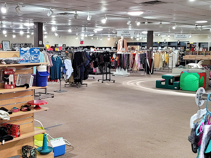 The clothing section stretches into the distance like a department store without the sticker shock. Fashion treasures hide in plain sight.