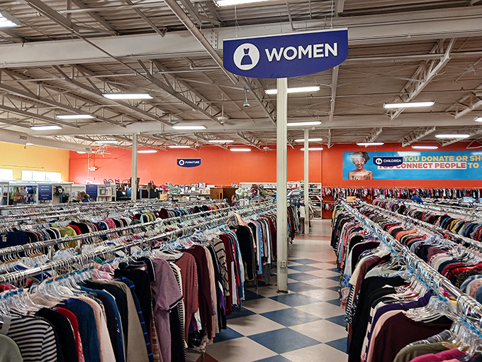 Women's section stretching endlessly, where fashion decades collide in the most delightful way possible.