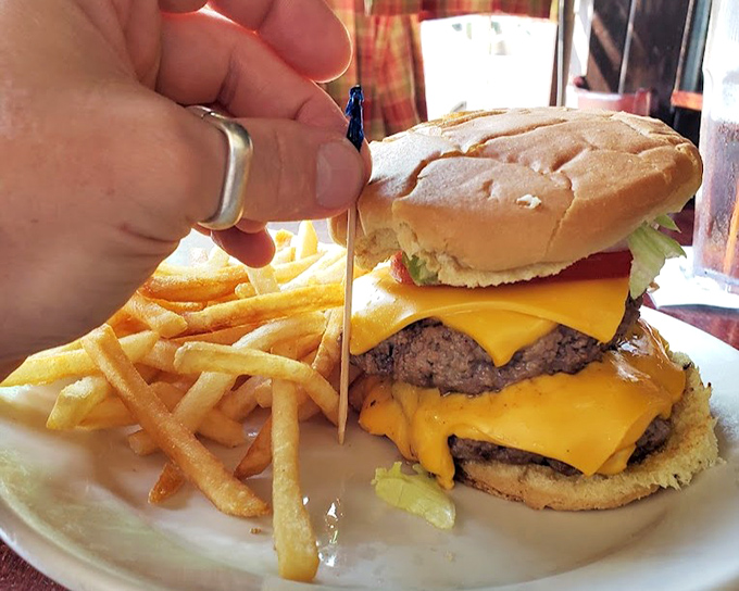 The Double Zip Burger with cheese &ndash; where two patties meet their destiny under a blanket of perfectly melted American cheese.