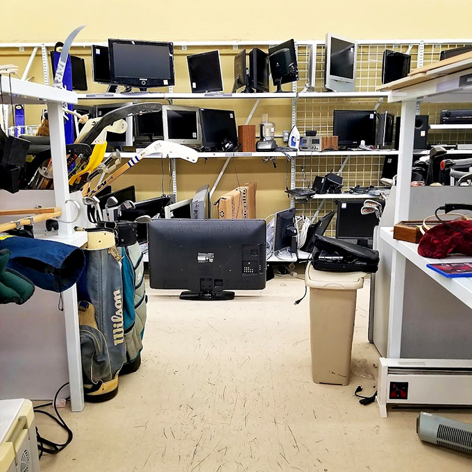 The electronics graveyard where yesterday's cutting-edge technology finds new purpose. That monitor might be older than your Netflix subscription.