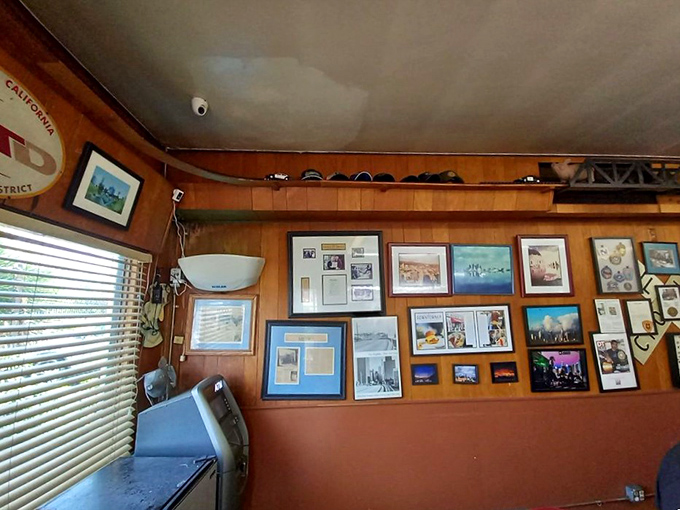 The walls tell stories of decades past, while the wood paneling has absorbed enough coffee aroma to wake the sleepiest patron.