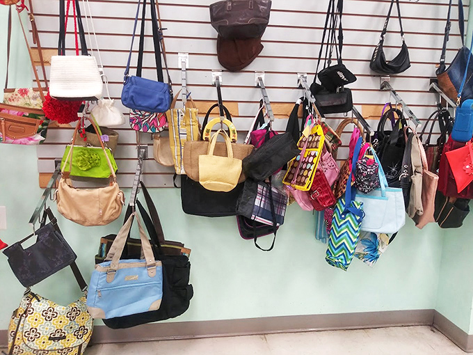 Handbag heaven hanging in hopeful anticipation. That yellow tote is practically screaming, "Take me to the farmers market this weekend