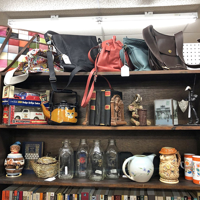 Vintage handbags and eclectic collectibles share shelf space in this treasure hunter's dream arrangement.