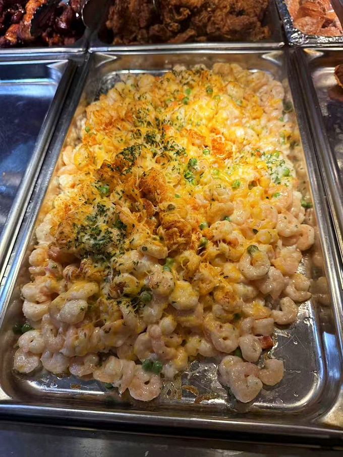 Mac and cheese elevated to art form status. Those tiny shrimp nestled among cheesy pasta are like delicious hidden treasures.