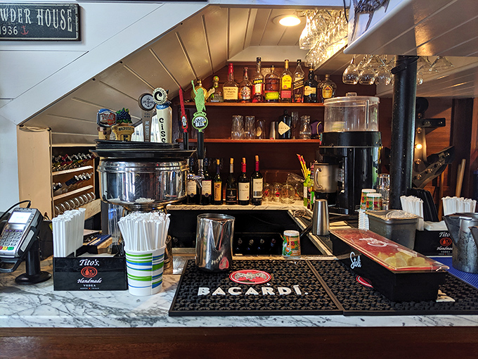 The bar: where oysters are shucked, stories are shared, and decisions about whether to order dessert become surprisingly difficult.