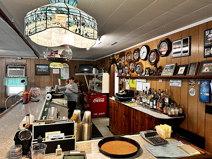 Behind the bar, decades of memorabilia tell stories that no menu ever could&mdash;each bottle backed by maritime history.